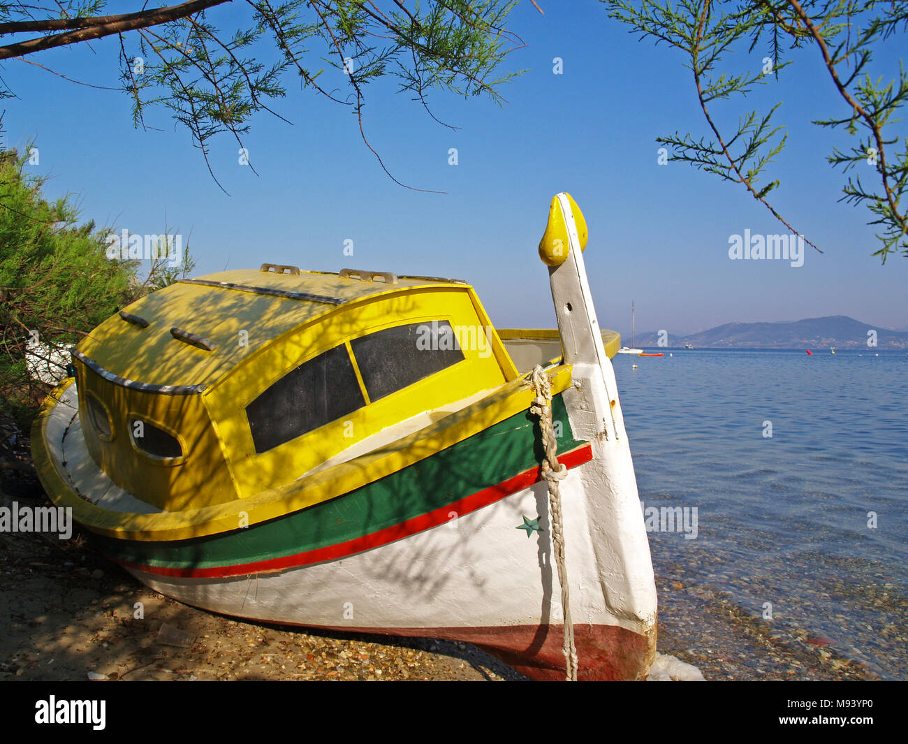 Small colorful boat washed ashore to La Madrague de Giens Stock Photo ...