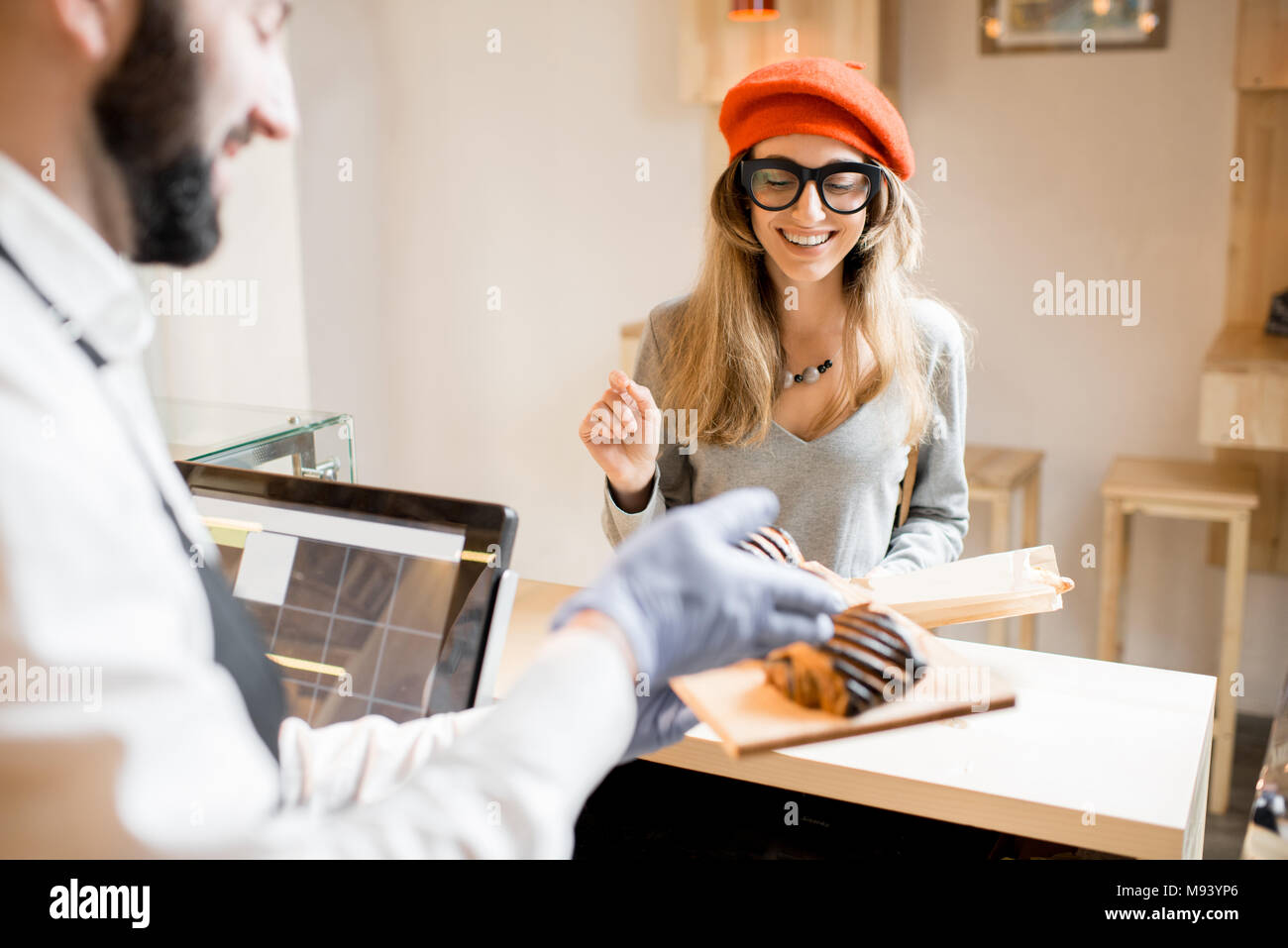 Female baker french bread hi-res stock photography and images - Alamy