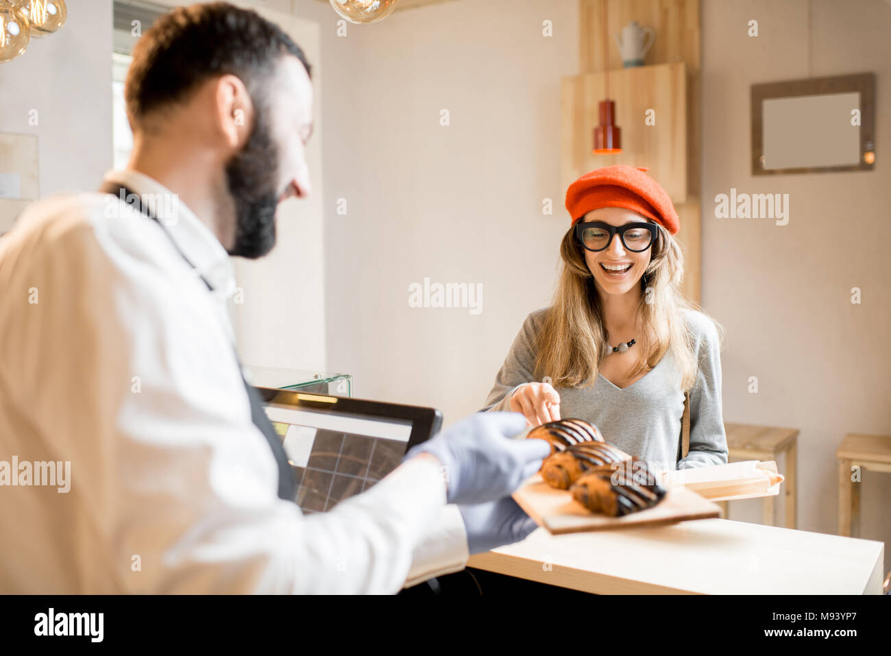 Female baker french bread hi-res stock photography and images - Alamy