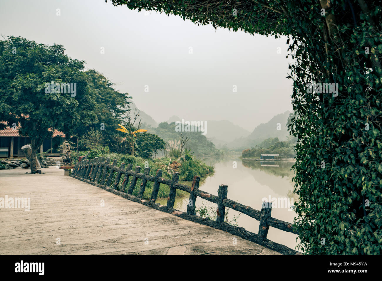 under an archway in vietnam Stock Photo - Alamy