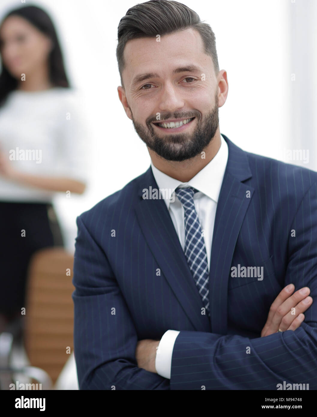 businessman on background of office Stock Photo - Alamy
