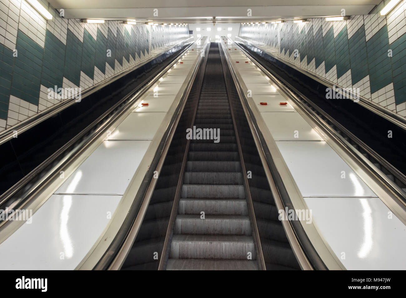 Escalator in an underground subway Stock Photo - Alamy