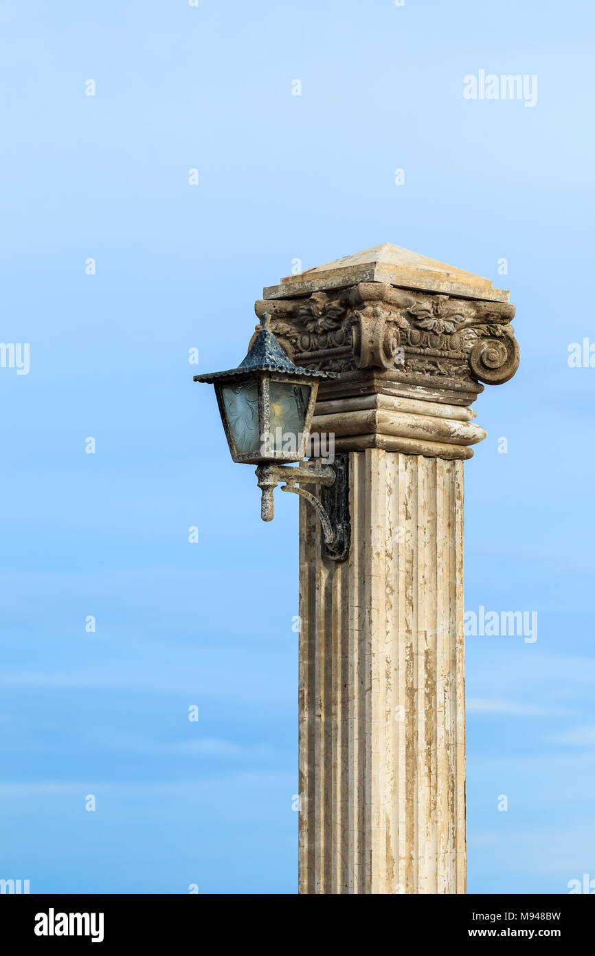 Old lamp post beside the sea Stock Photo - Alamy
