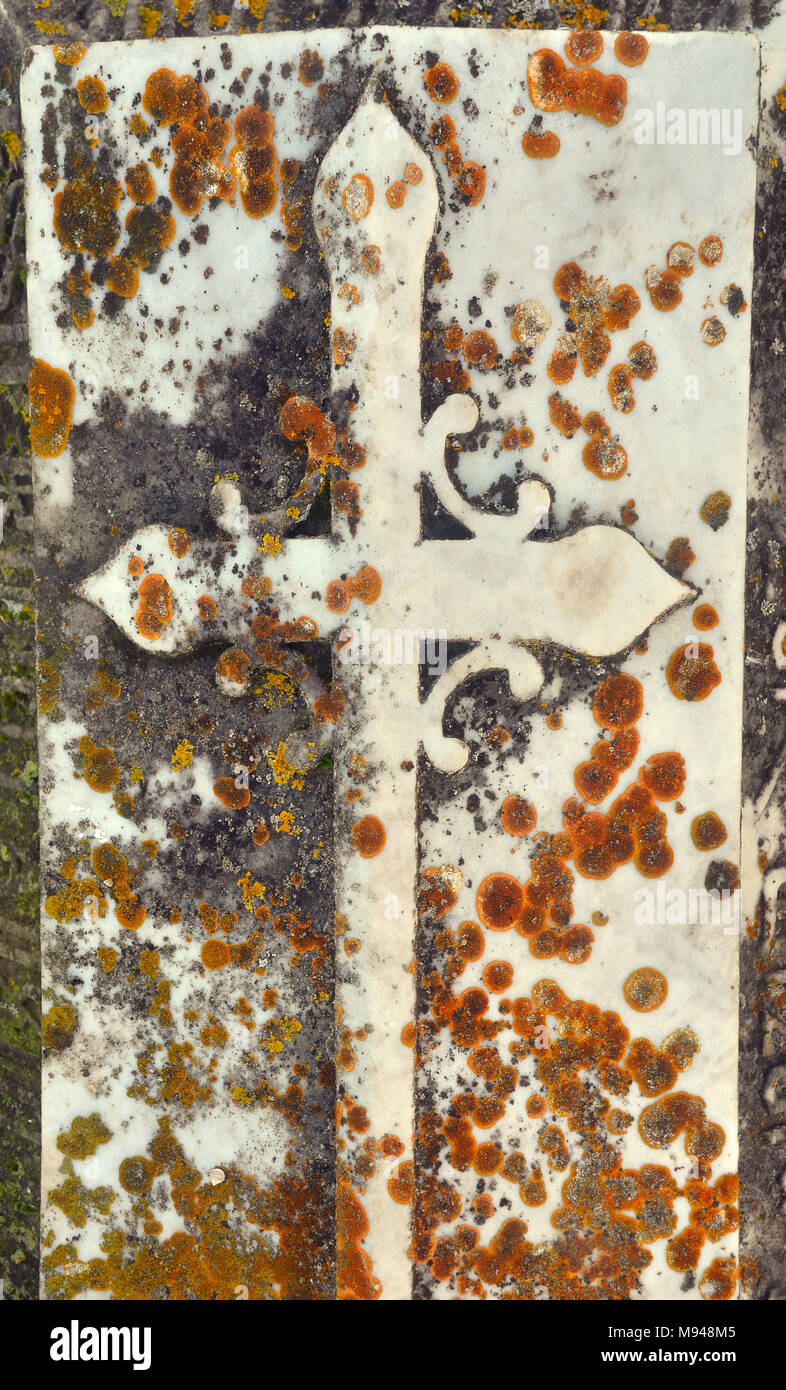 Old gravestone showing a medieval sword with ornate hilt carved out of ...