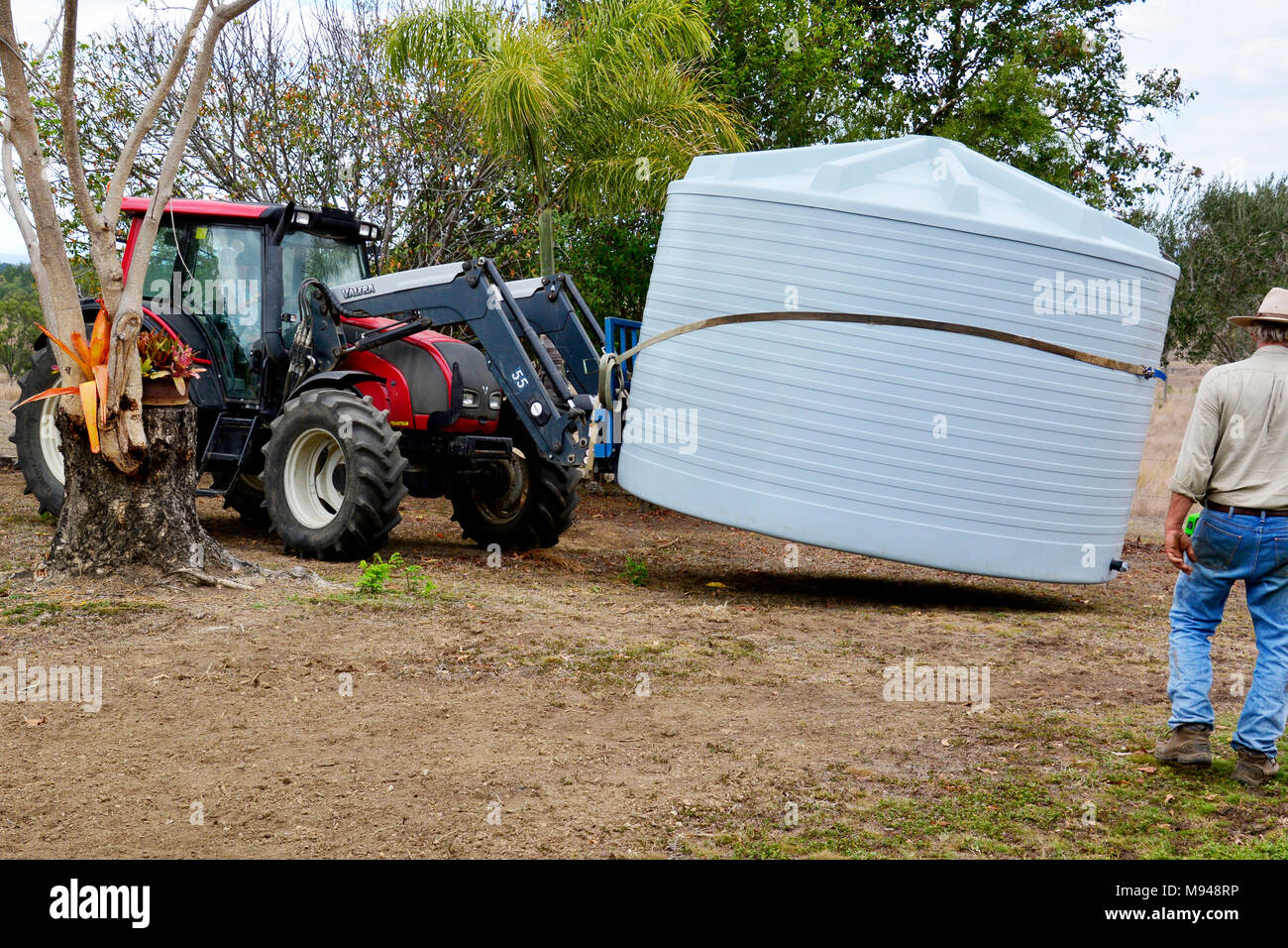 INSTALLING A WATER TANK Stock Photo - Alamy