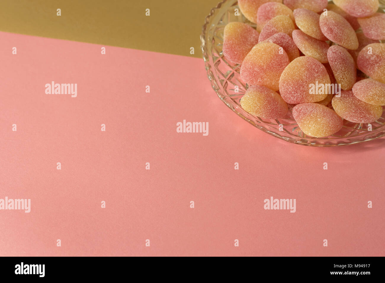 Bowl of sugared jelly sweets in crystal cut glass dish - on minimal ...