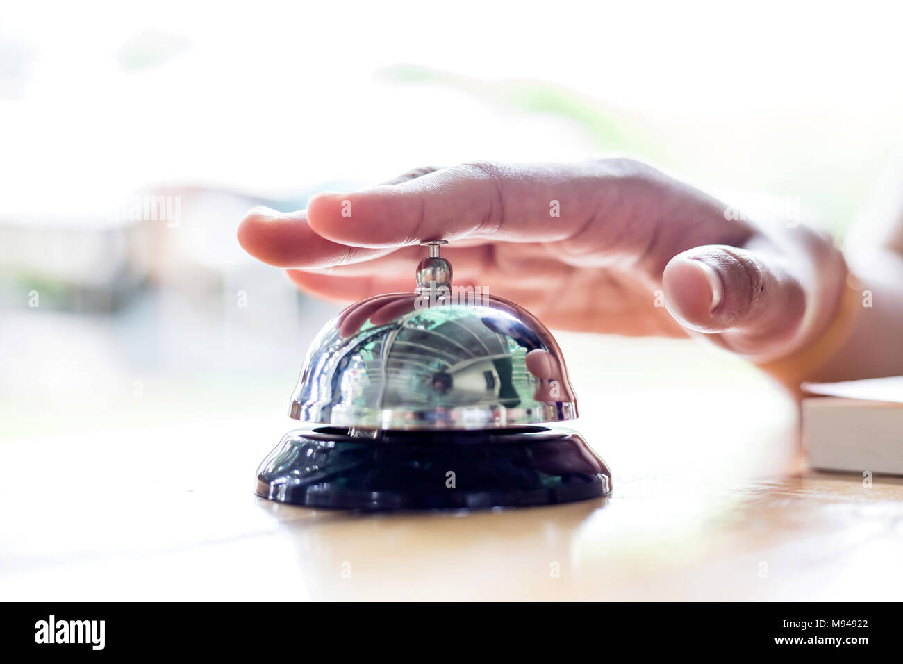Service Bell. Person using their finger to ring a counter bell.ฃ Stock ...