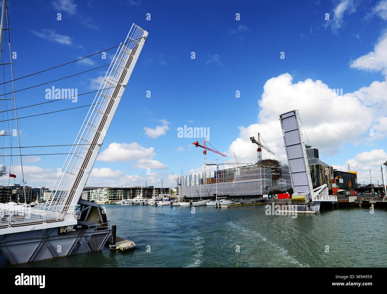 Wynyard Crossing opens for boats at Auckland's Viaduct harbour Stock ...