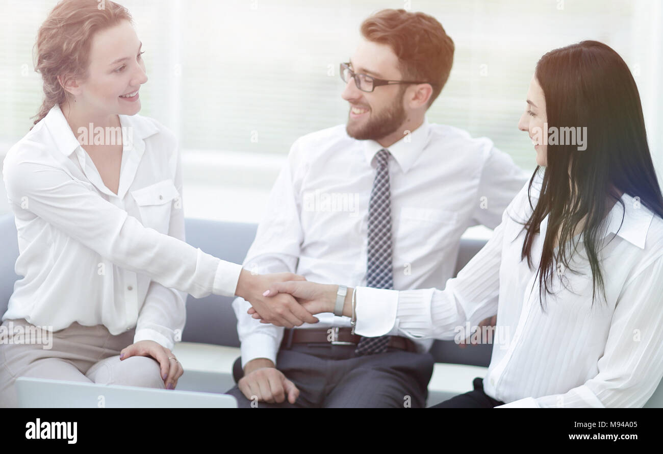 handshake of manager and client in the office lobby Stock Photo - Alamy