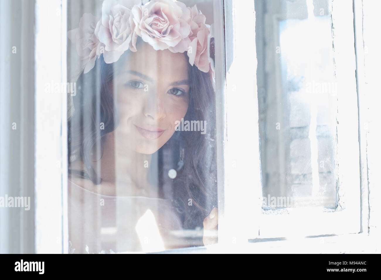 Beautiful Woman Looking out the Window Stock Photo - Alamy