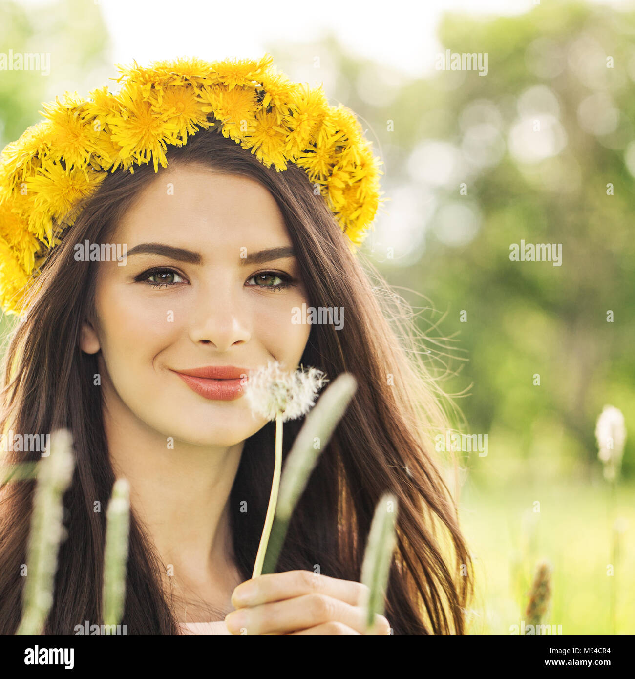 Pretty girl wearing wreath flowers hi-res stock photography and images ...