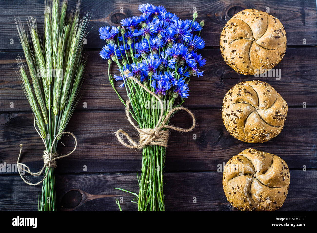 Fresh buns on rustic wooden table, bakery products , flat lay Stock ...