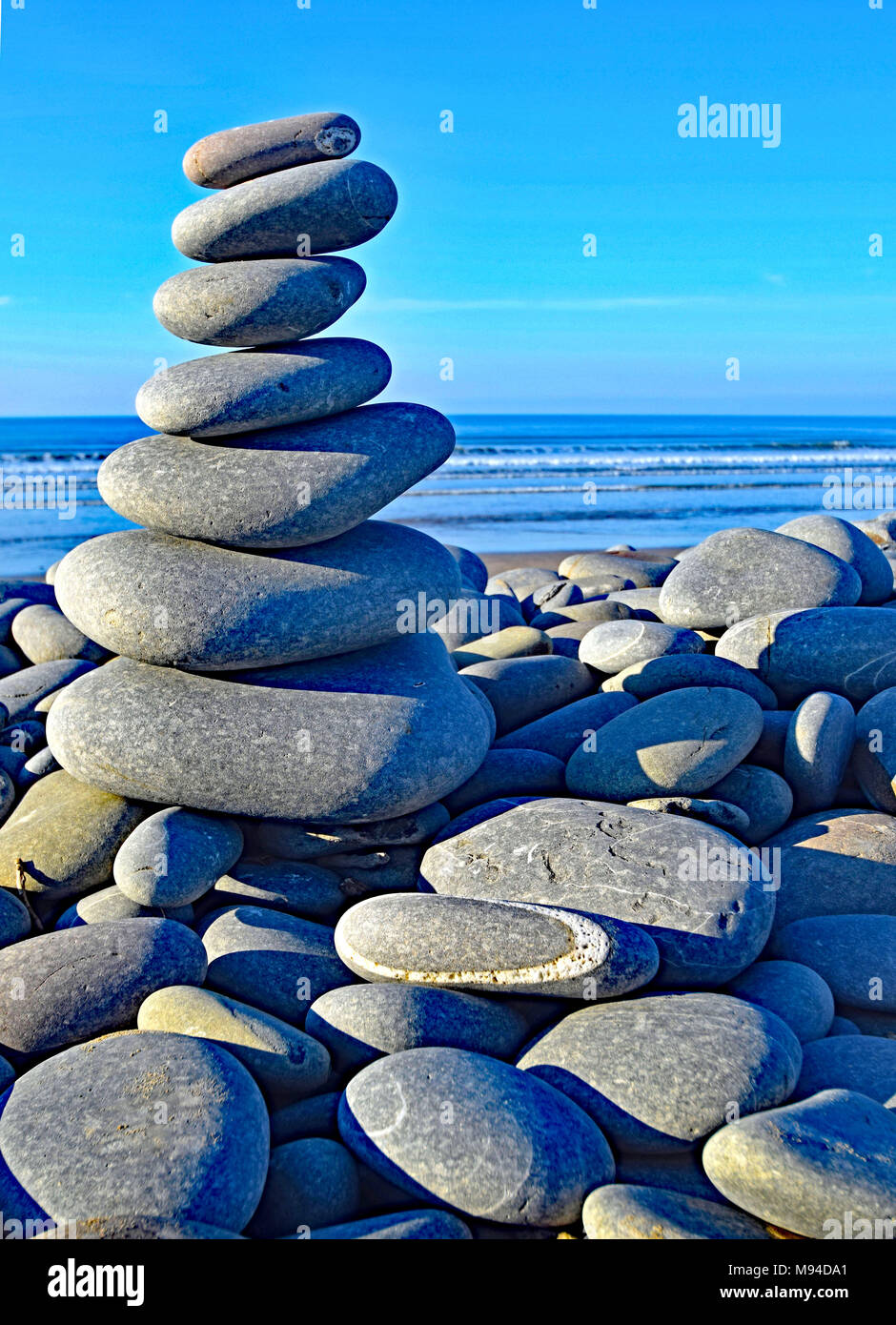 Balanced stones on the Pebble Ridge at Westward Ho! in North Devon ...