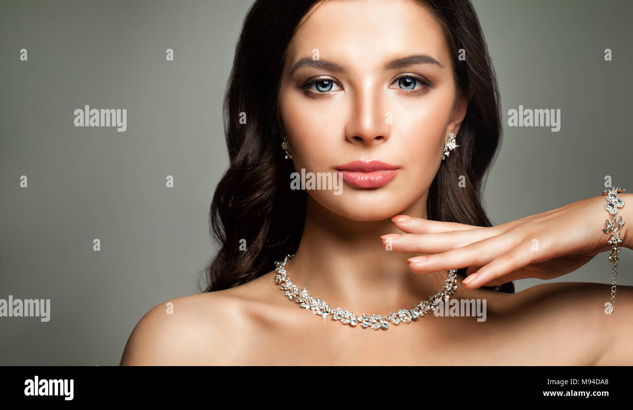 Beautiful Female Face. Young Woman with Perfect Diamond Jewelry Stock ...