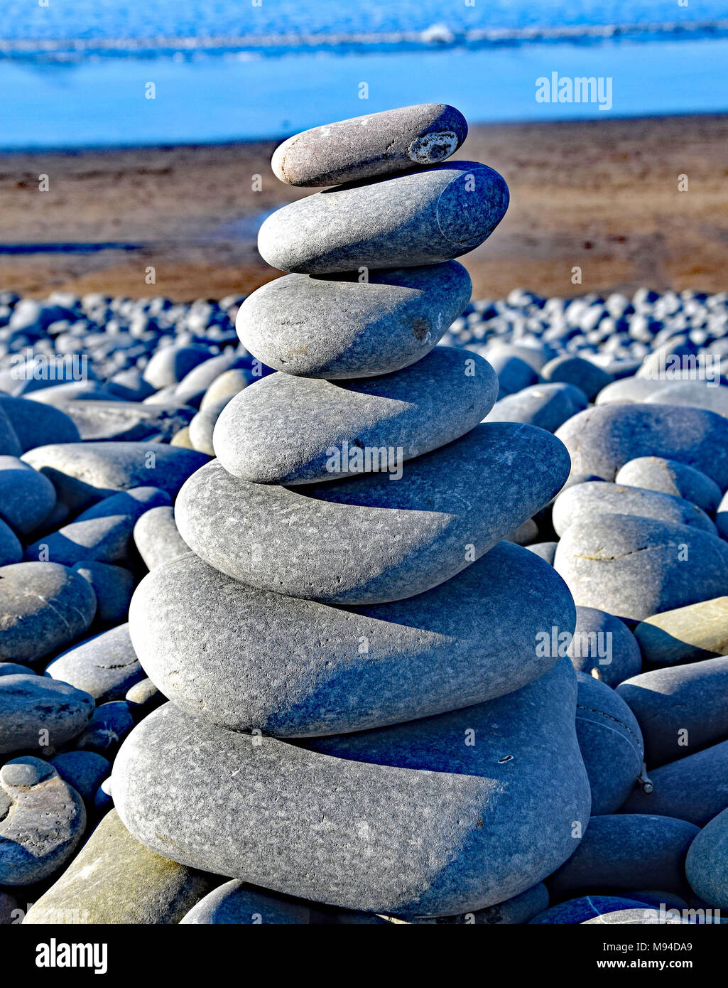 Balanced stones on the Pebble Ridge at Westward Ho! in North Devon ...