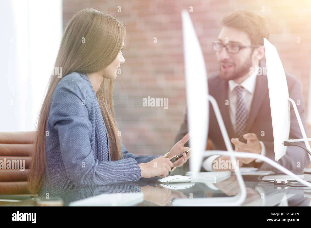 Successful employees sitting desk hi-res stock photography and images ...