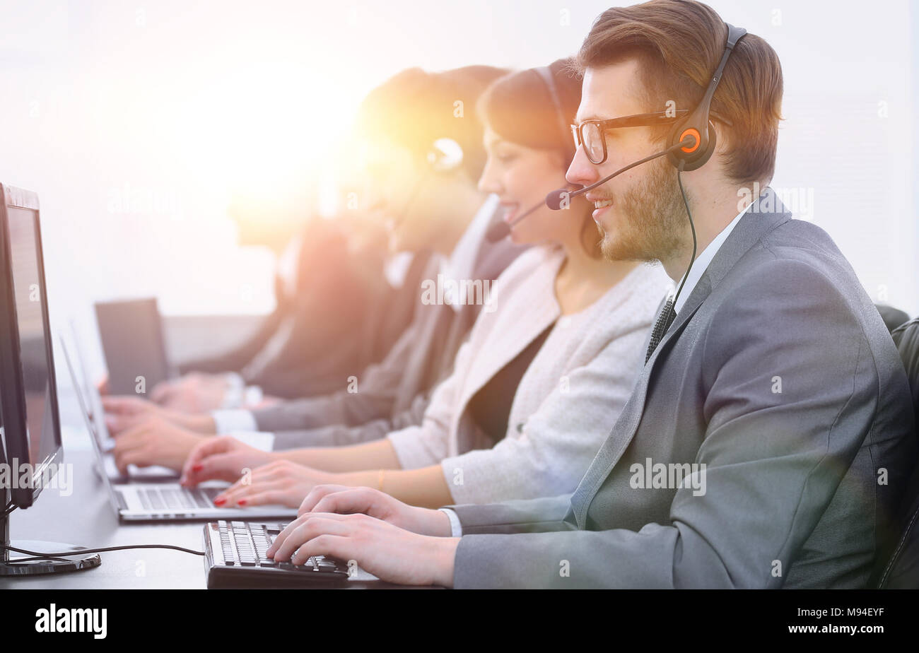 colleagues call centre workplace in the office Stock Photo - Alamy