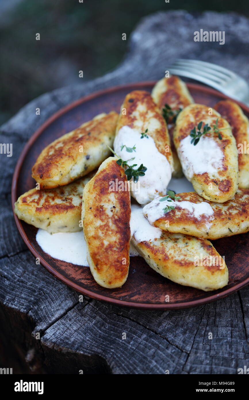 Fish cutlet with sauce Stock Photo - Alamy