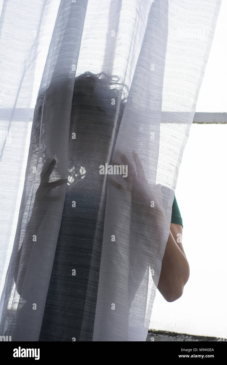 Hide behind blinds hi-res stock photography and images - Alamy
