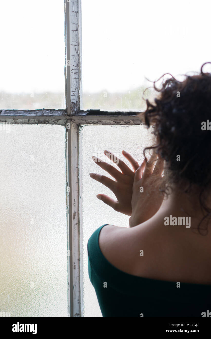 Woman 20s sad rear view hi-res stock photography and images - Alamy