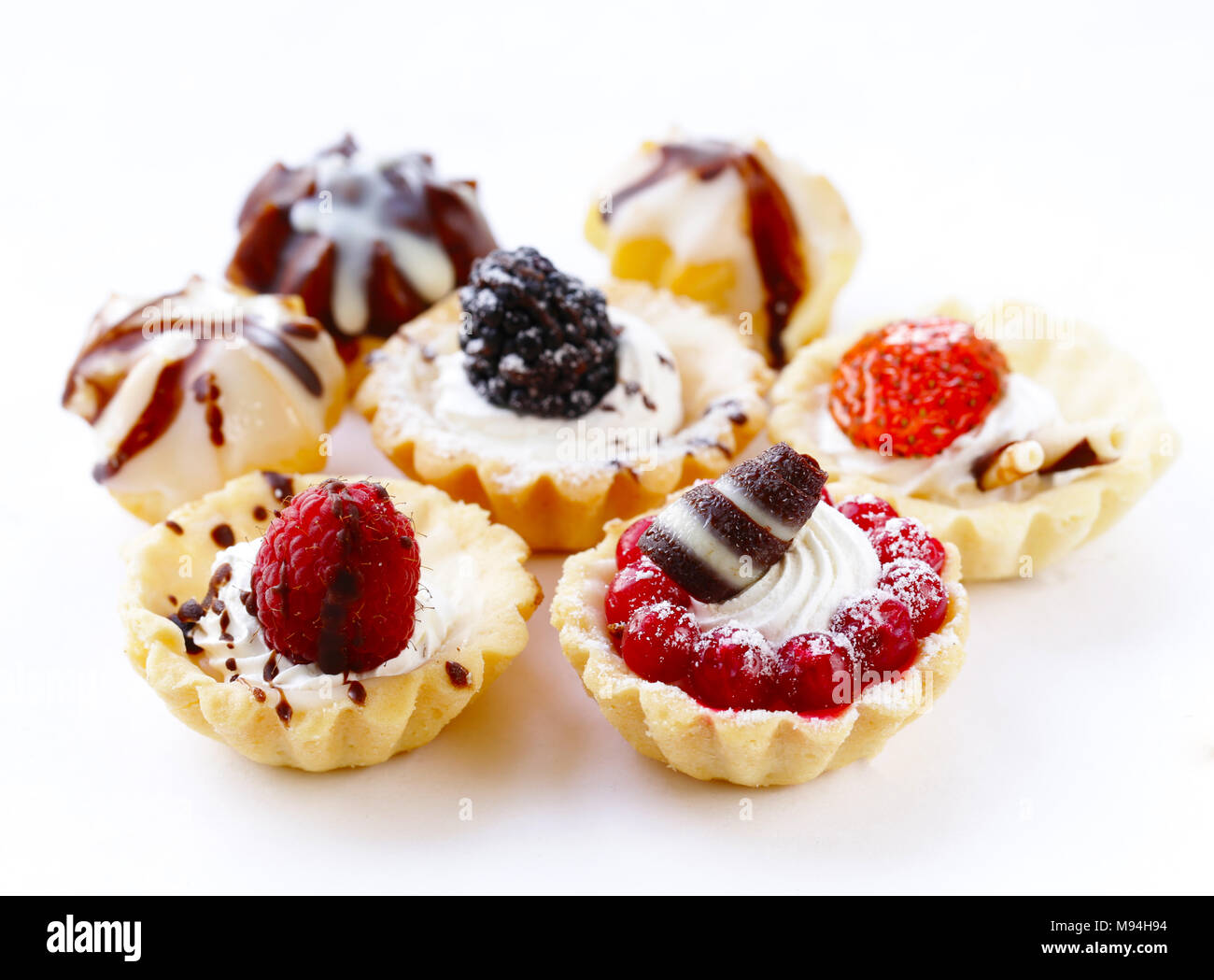 Mini dessert tarts sweet pastries for the holiday Stock Photo - Alamy