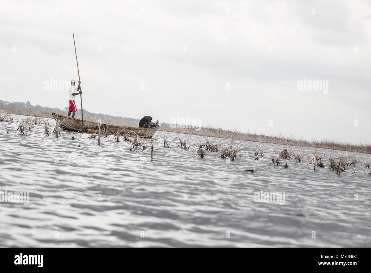 A fisherman on lake Nokoué, southern Benin Stock Photo - Alamy