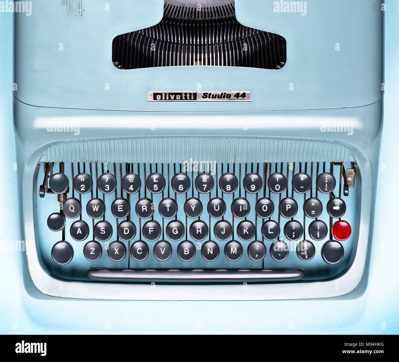 Retro typewriter in blue Stock Photo - Alamy