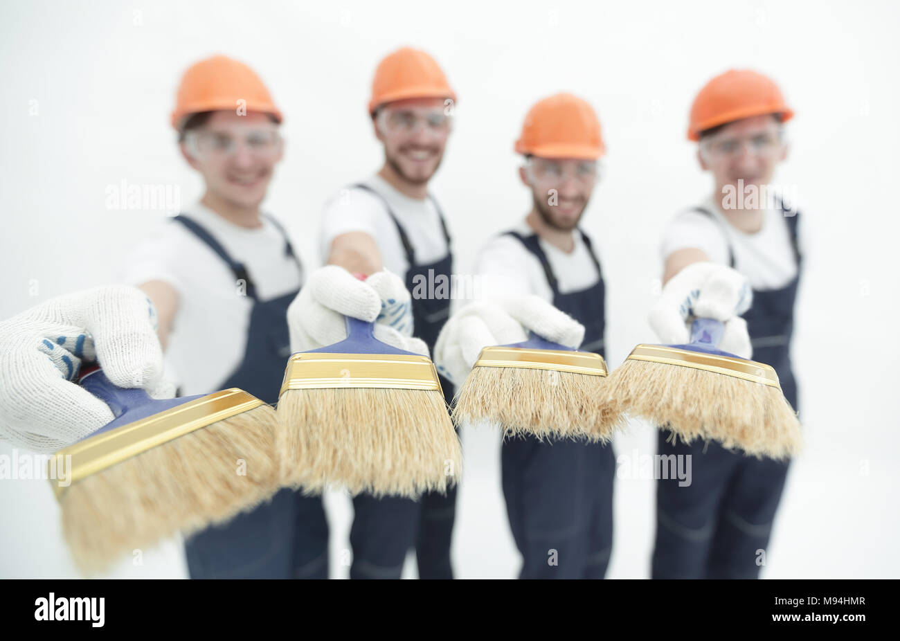 group of builders with different tools Stock Photo - Alamy