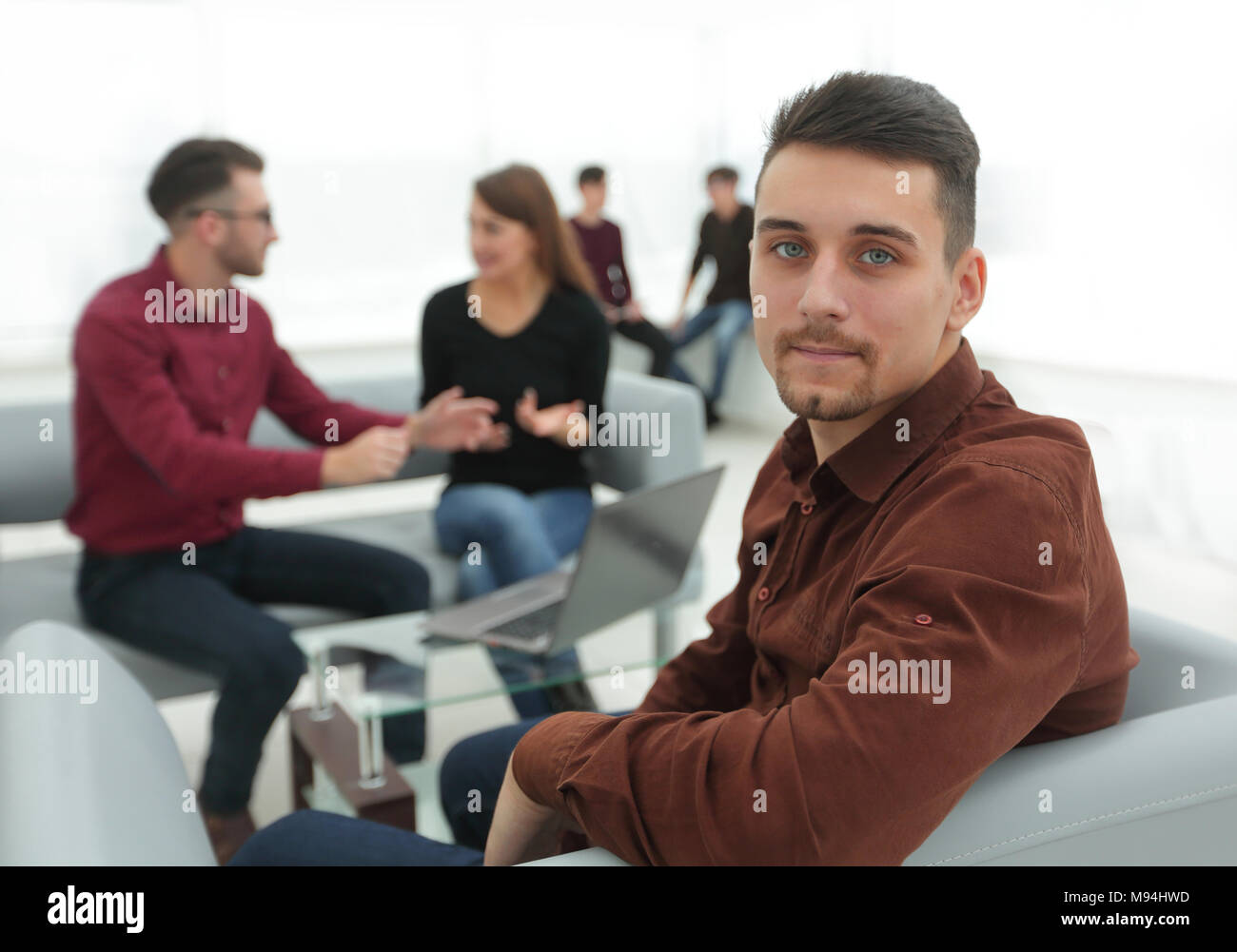 employee on the background of business team Stock Photo - Alamy