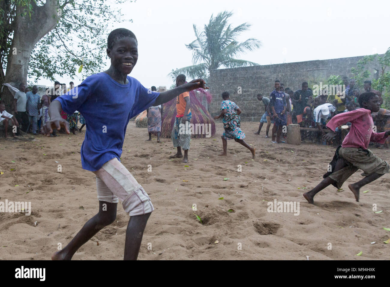 Residents of a small village near Ouidah, southern Benin, take part in ...