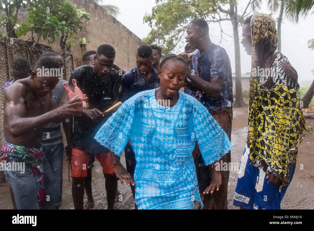 Residents of a small village near Ouidah, southern Benin, take part in ...