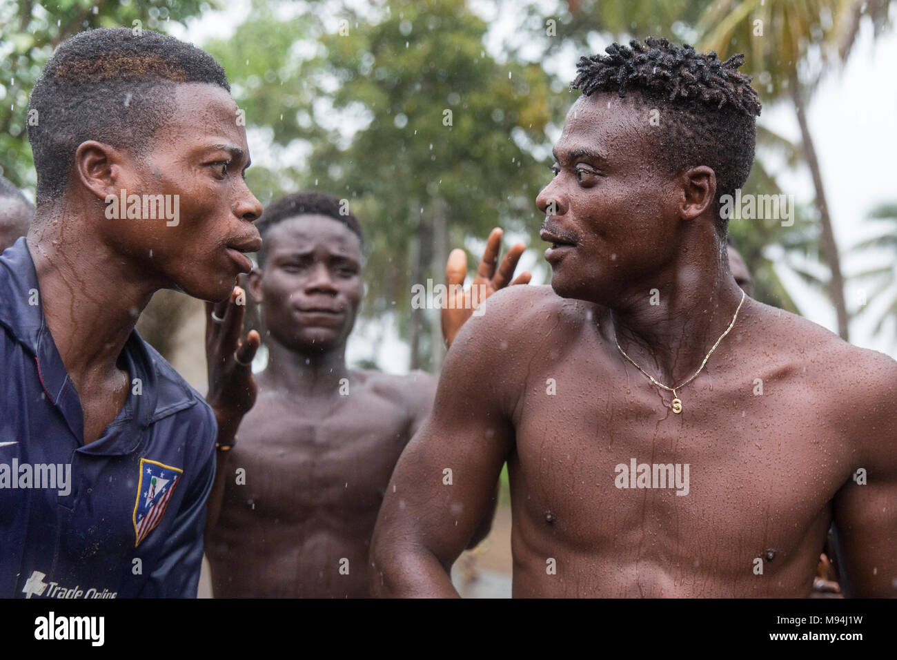 Residents of a small village near Ouidah, southern Benin, take part in ...