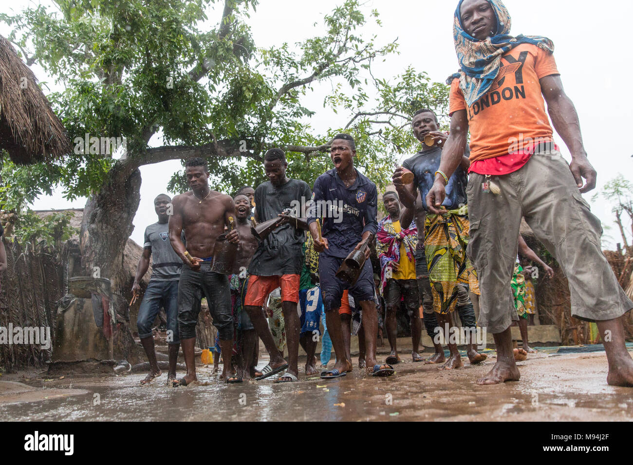 Residents of a small village near Ouidah, southern Benin, take part in ...