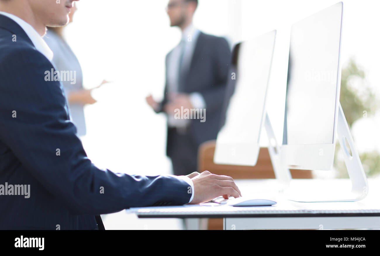 employee is typing on the computer keyboard Stock Photo - Alamy
