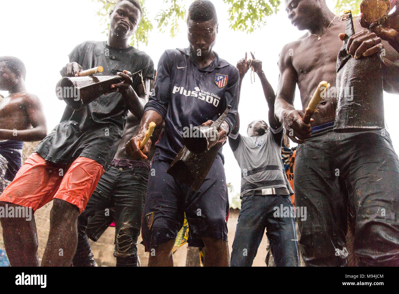 Residents of a small village near Ouidah, southern Benin, take part in ...