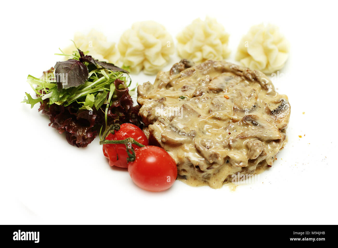 Roasted meat and garnish Stock Photo - Alamy