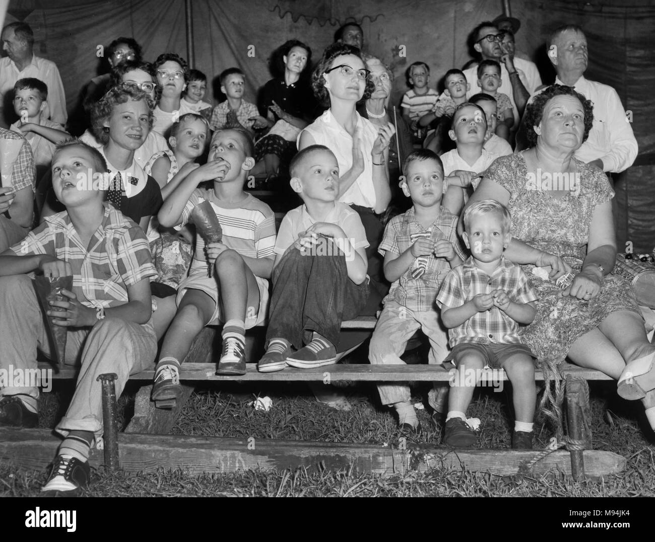 Audience members at a traveling circus in the US state of Georgia, ca ...