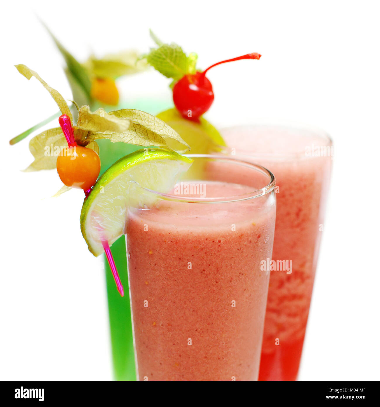 Fresh fruit cocktails on white background Stock Photo - Alamy