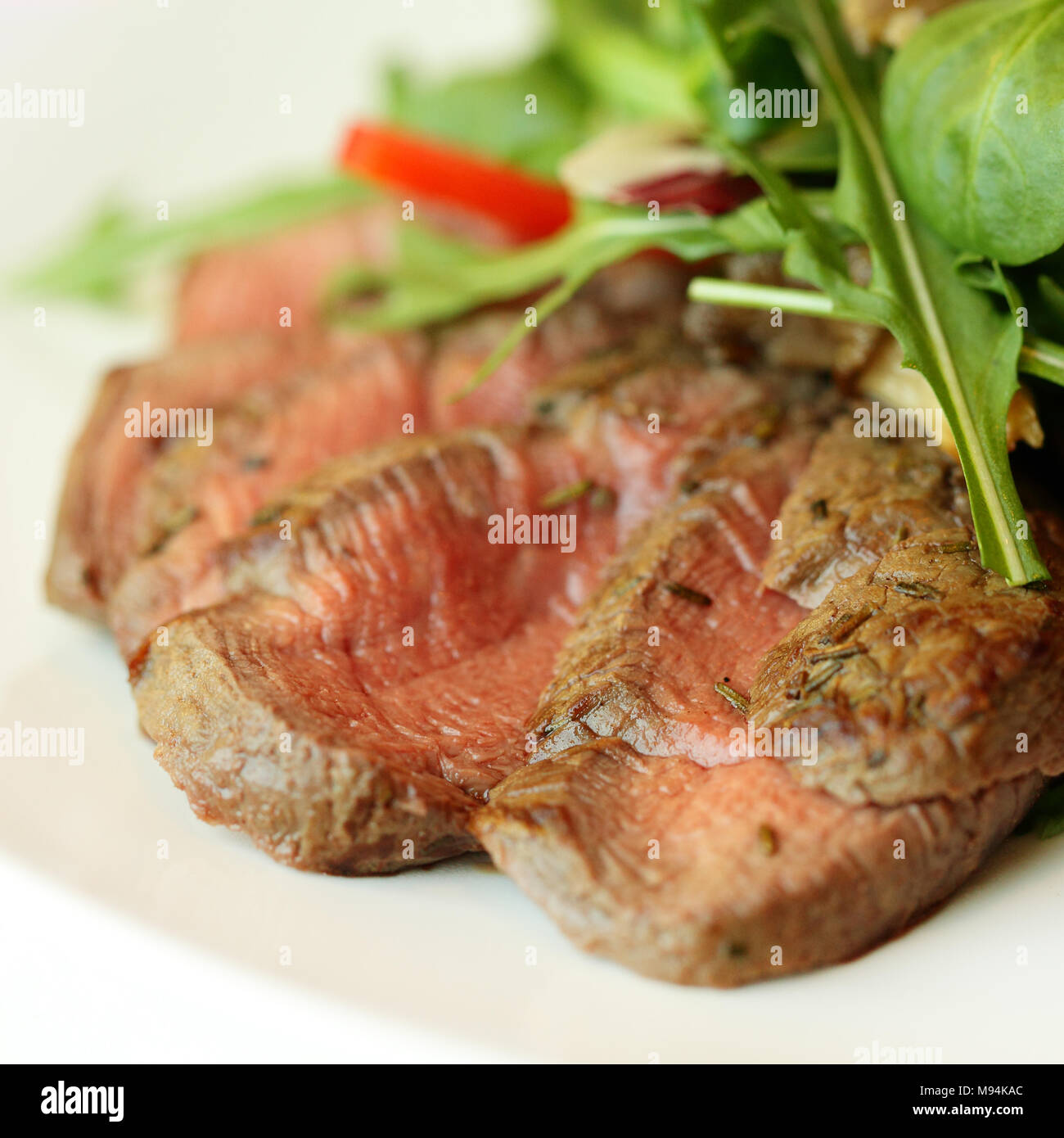 Gourmet restaurant food, meat and salad Stock Photo - Alamy