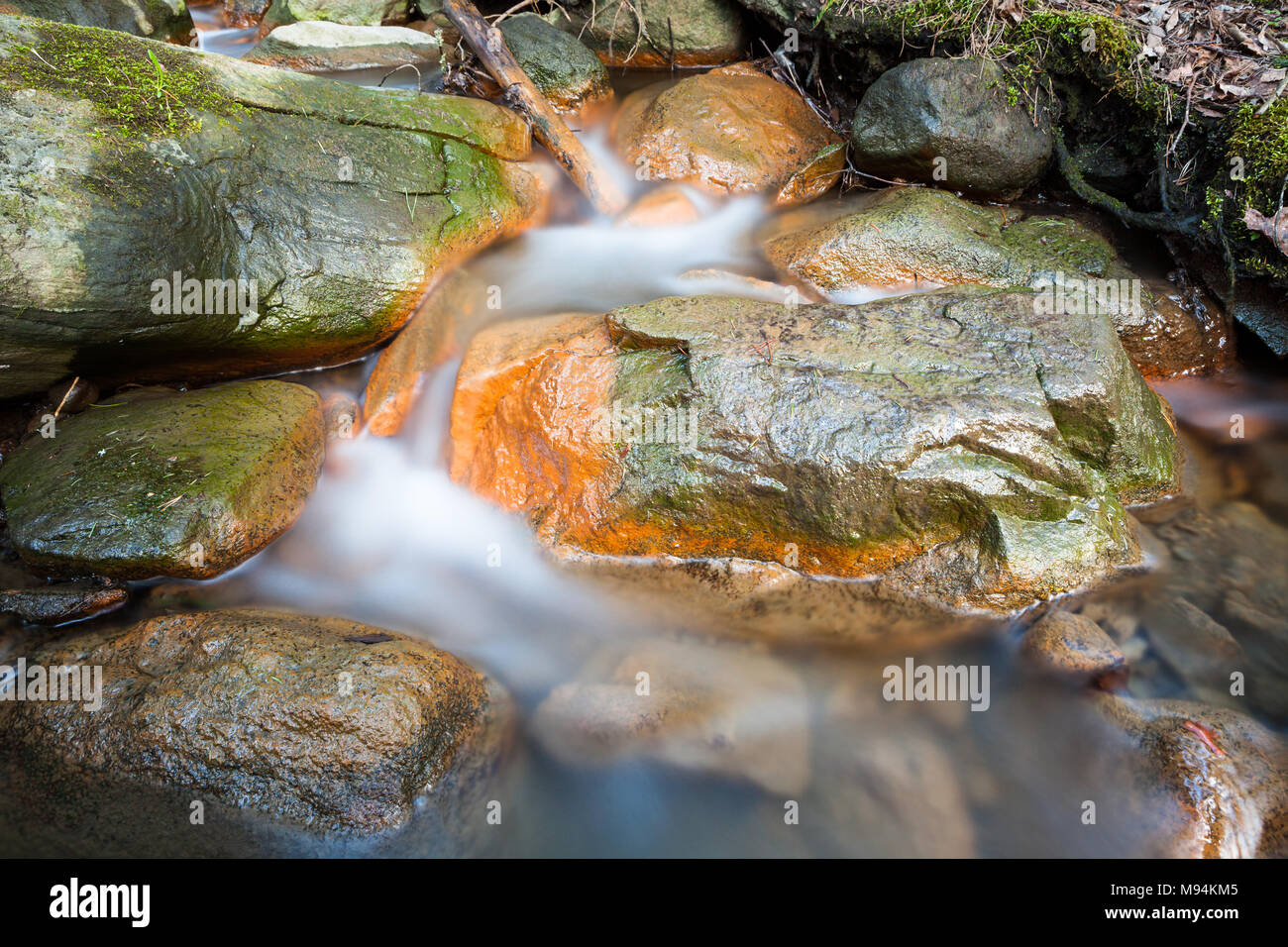 Small stream and rocks Stock Photo - Alamy