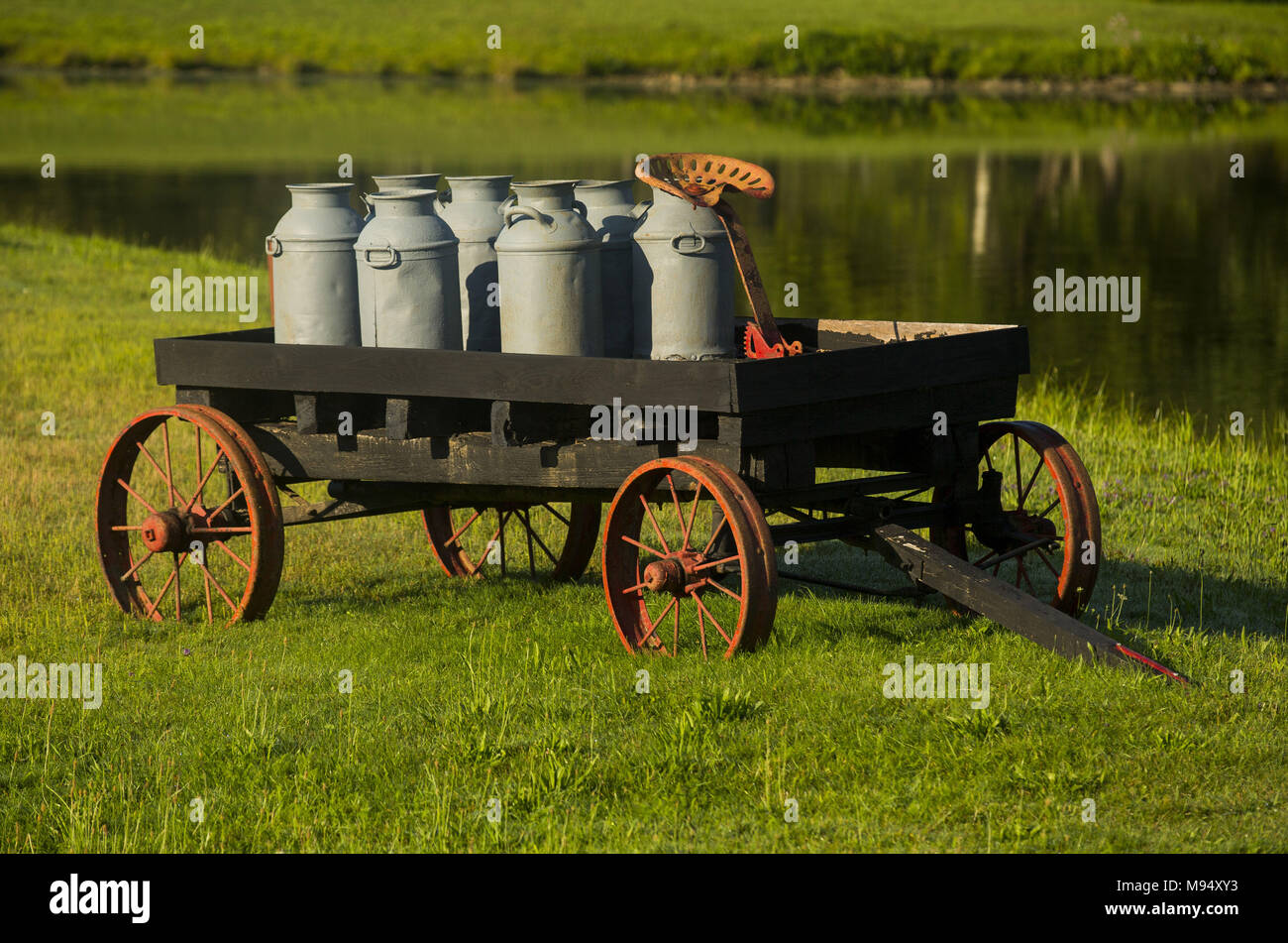Ava, New York, USA. 25th Aug, 2015. A classic milk jug cart sits near a ...