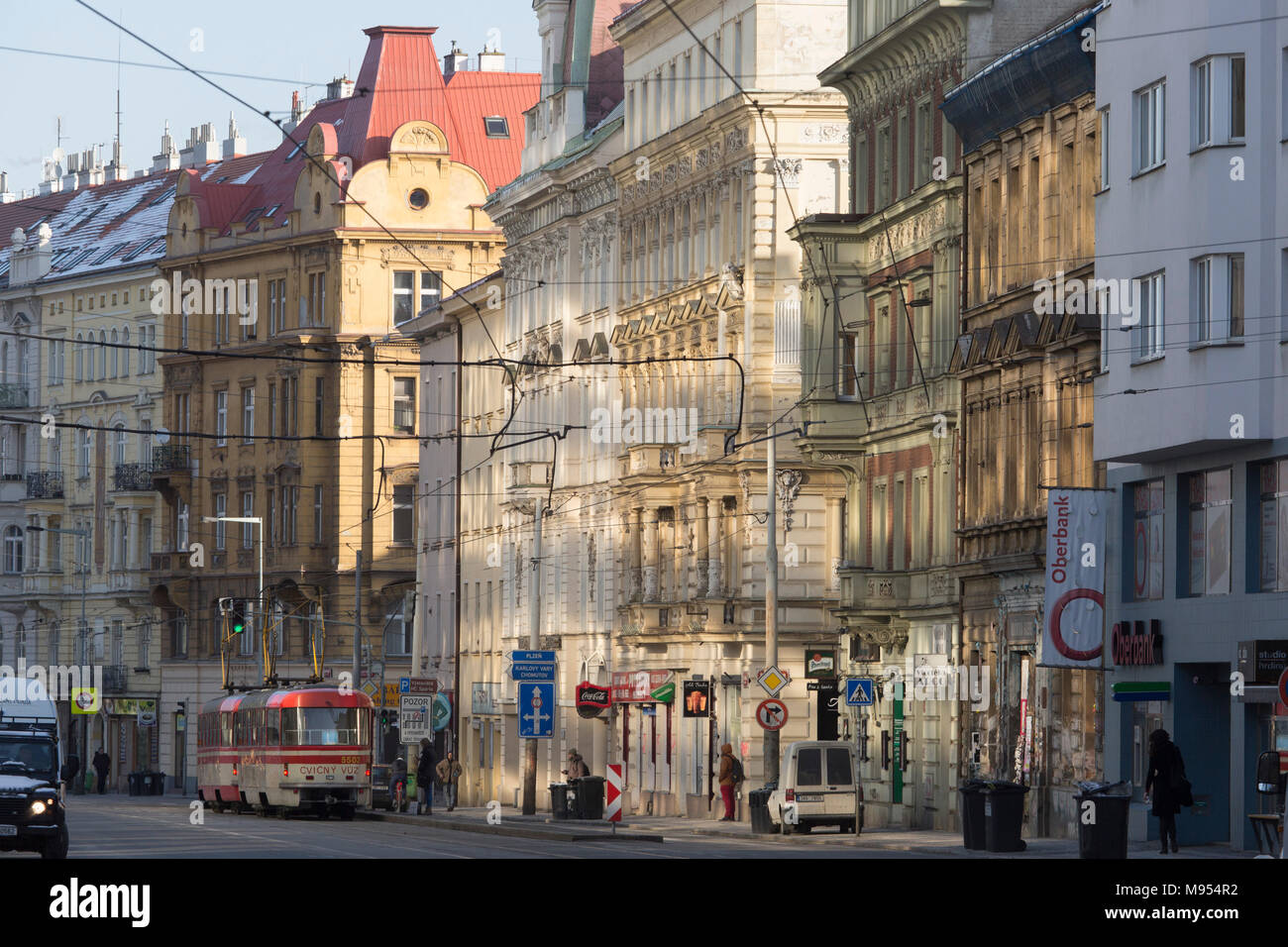 Reflected light from a nearby plate glass building, illuminates older ...