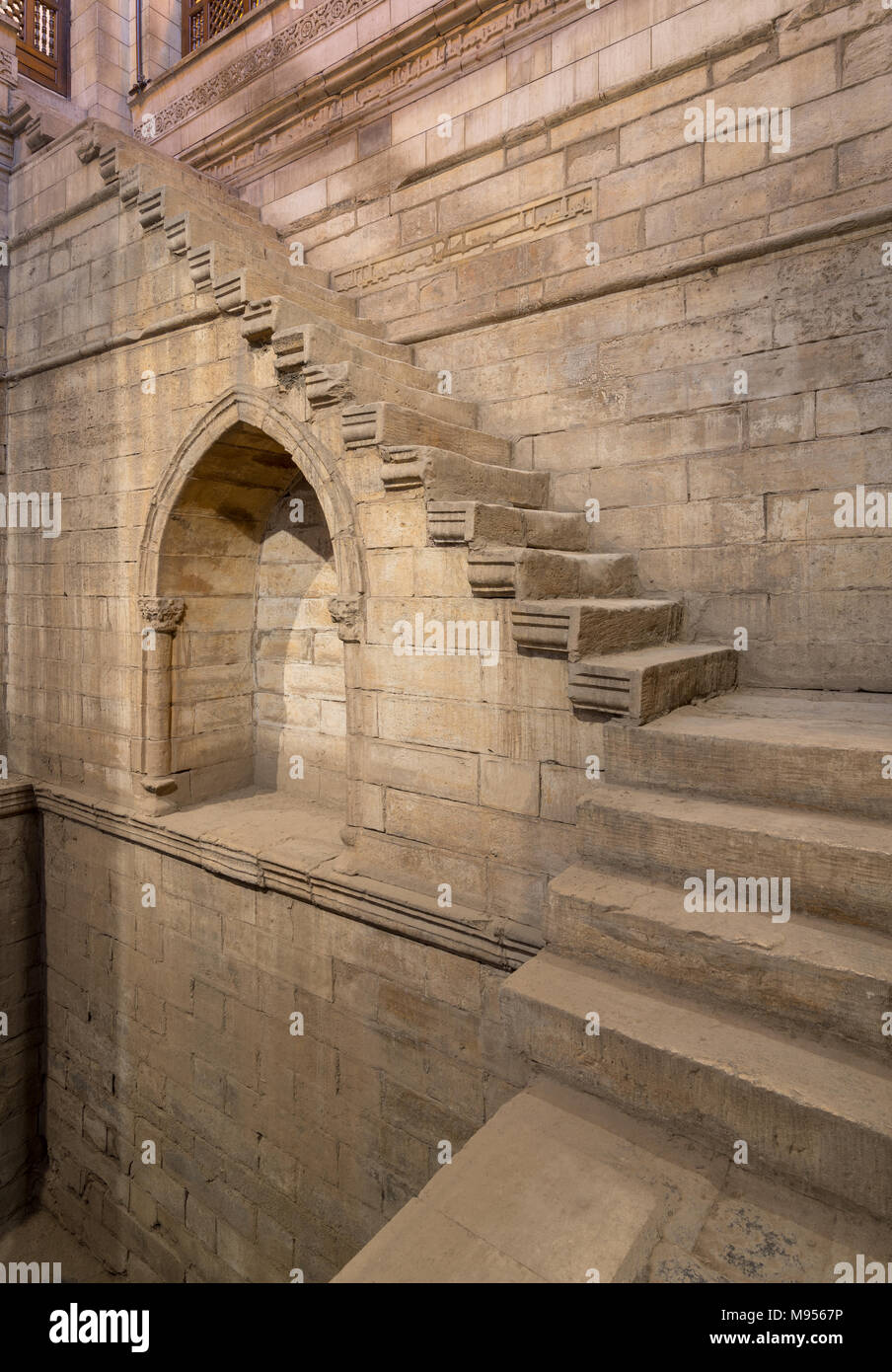 Stone staircase surrounding the walls of a deep well, Cairo, Egypt ...