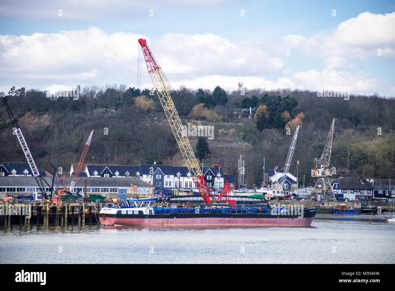 Boat unloading on the river medway, chatham, kent Stock Photo - Alamy