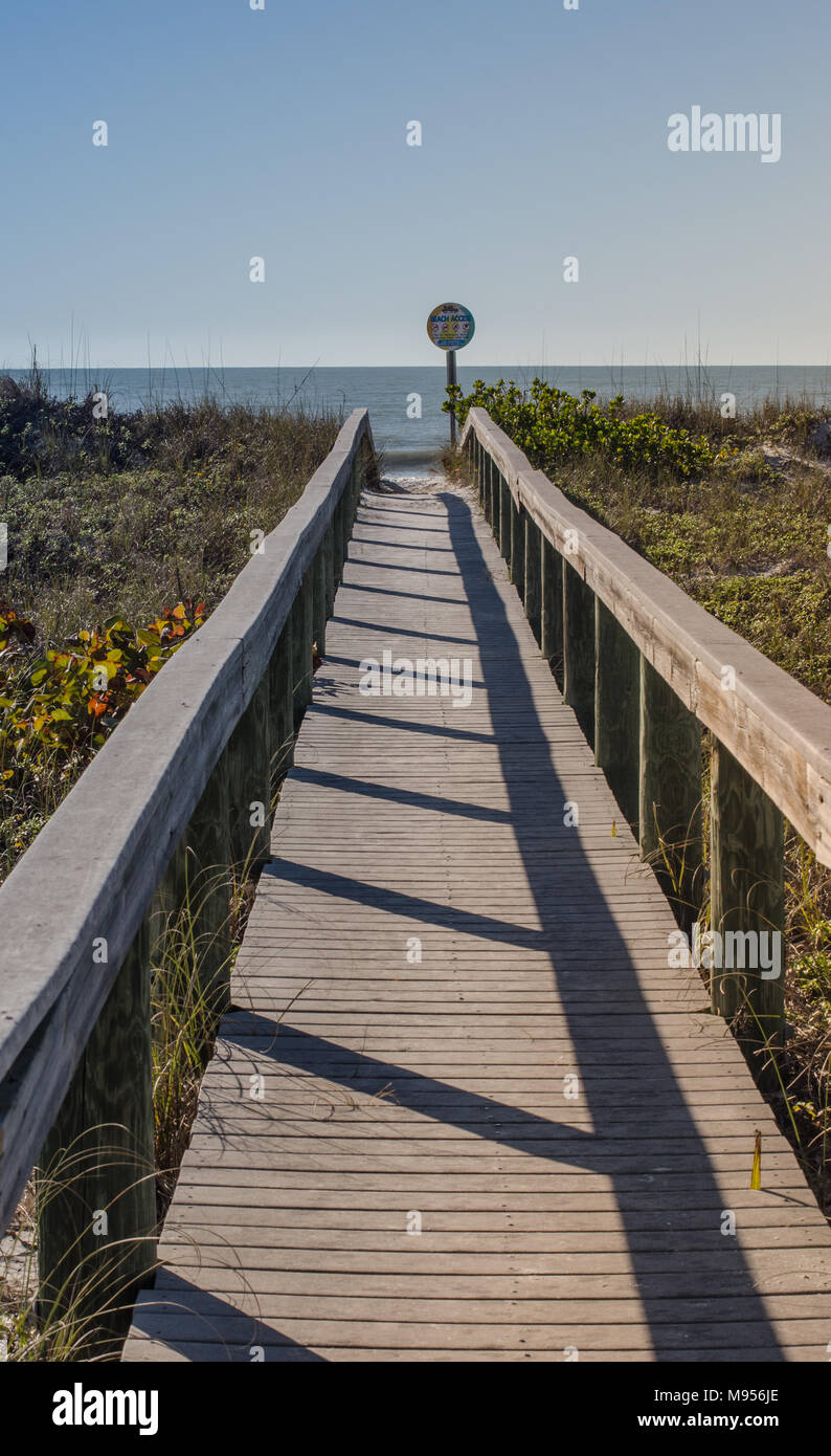 Wooden walk way leading to a St Petes's beach in florida Stock Photo ...