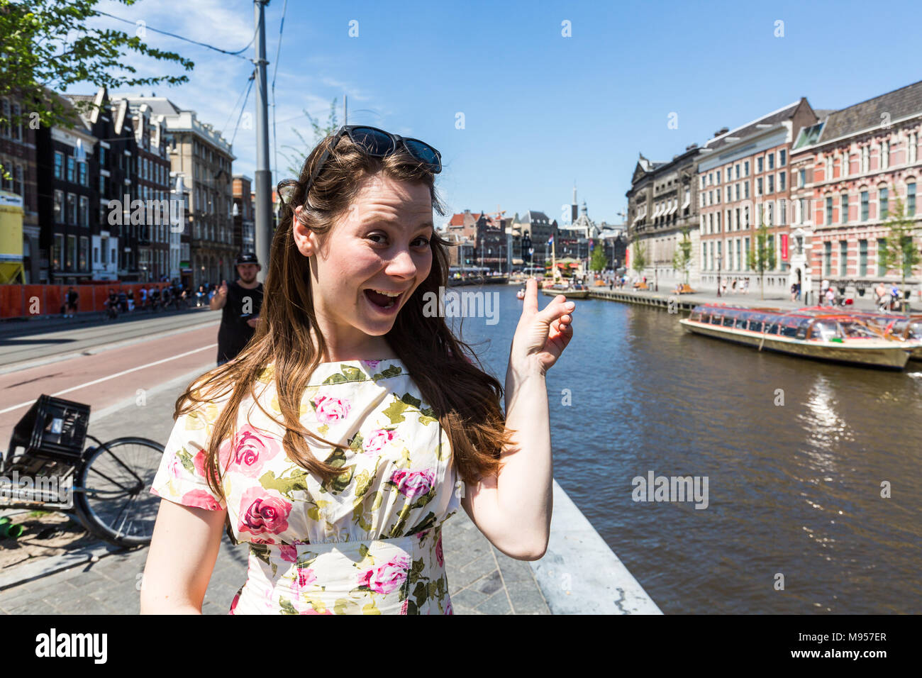 AMSTERDAM, NETHERLANDS - MAY 27, 2017: View of a tourist girl at the ...