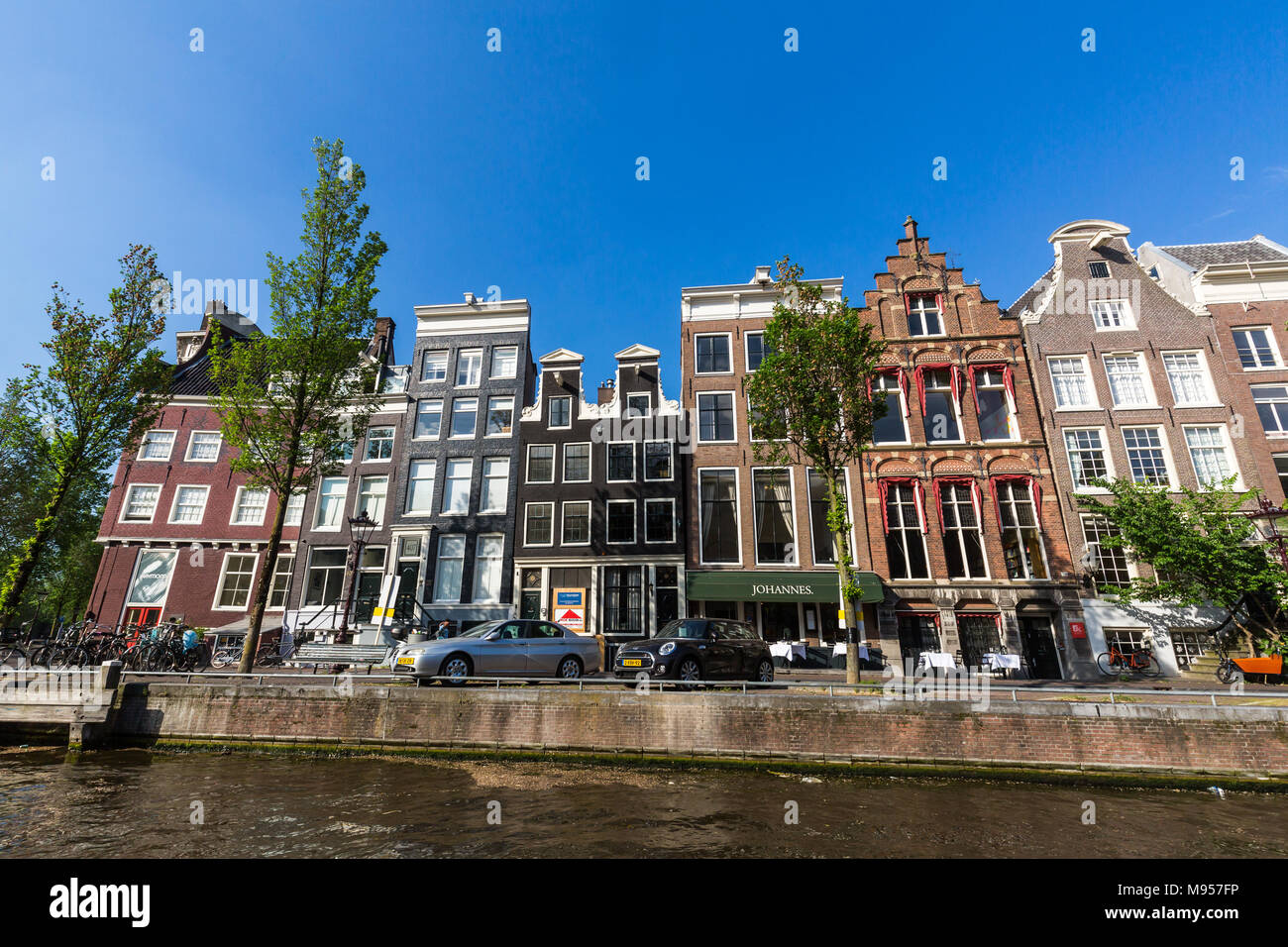AMSTERDAM, NETHERLANDS - MAY 27, 2017: View of typical Dutch buildings ...