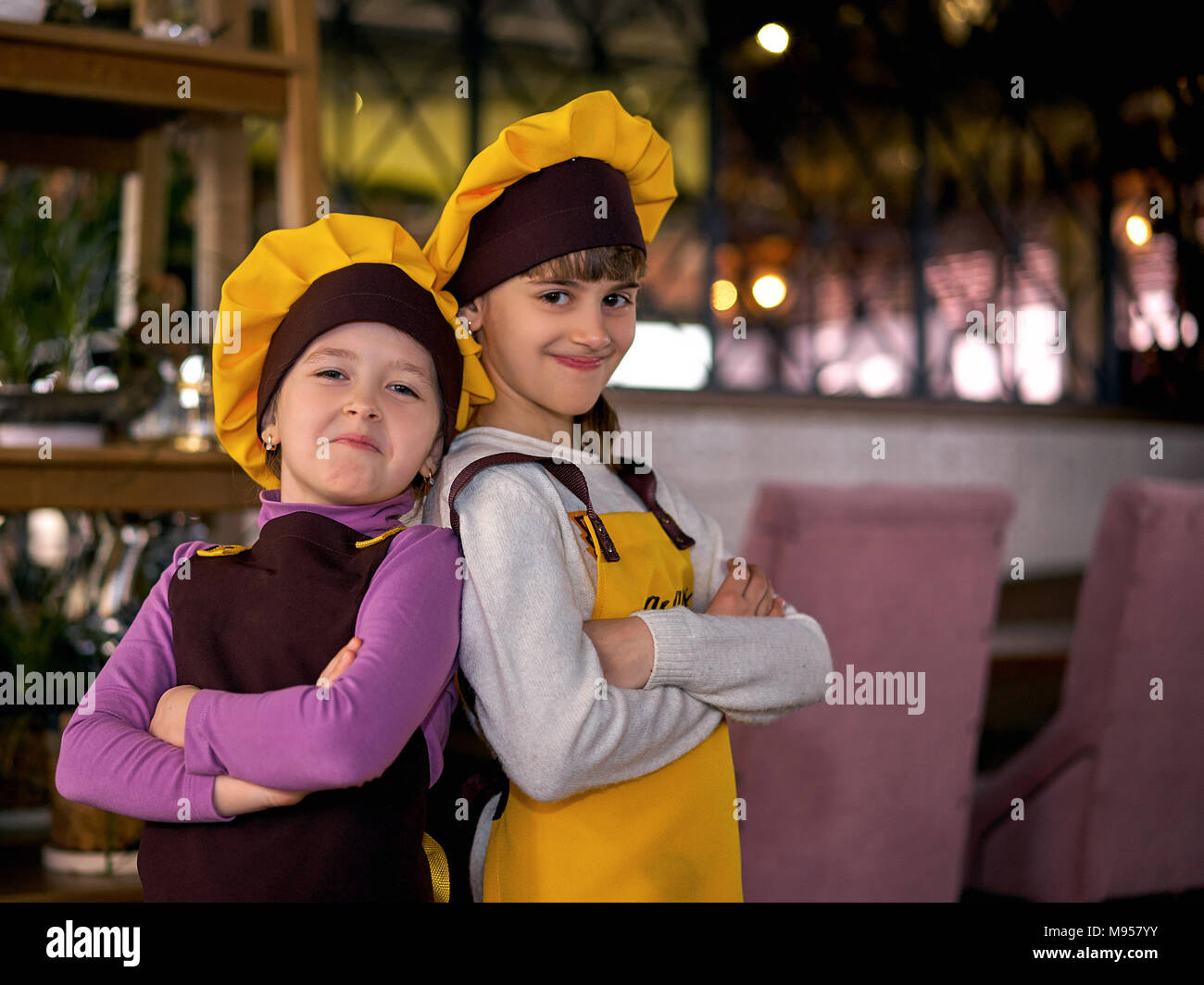 girl in the hood chef restaurant Stock Photo - Alamy