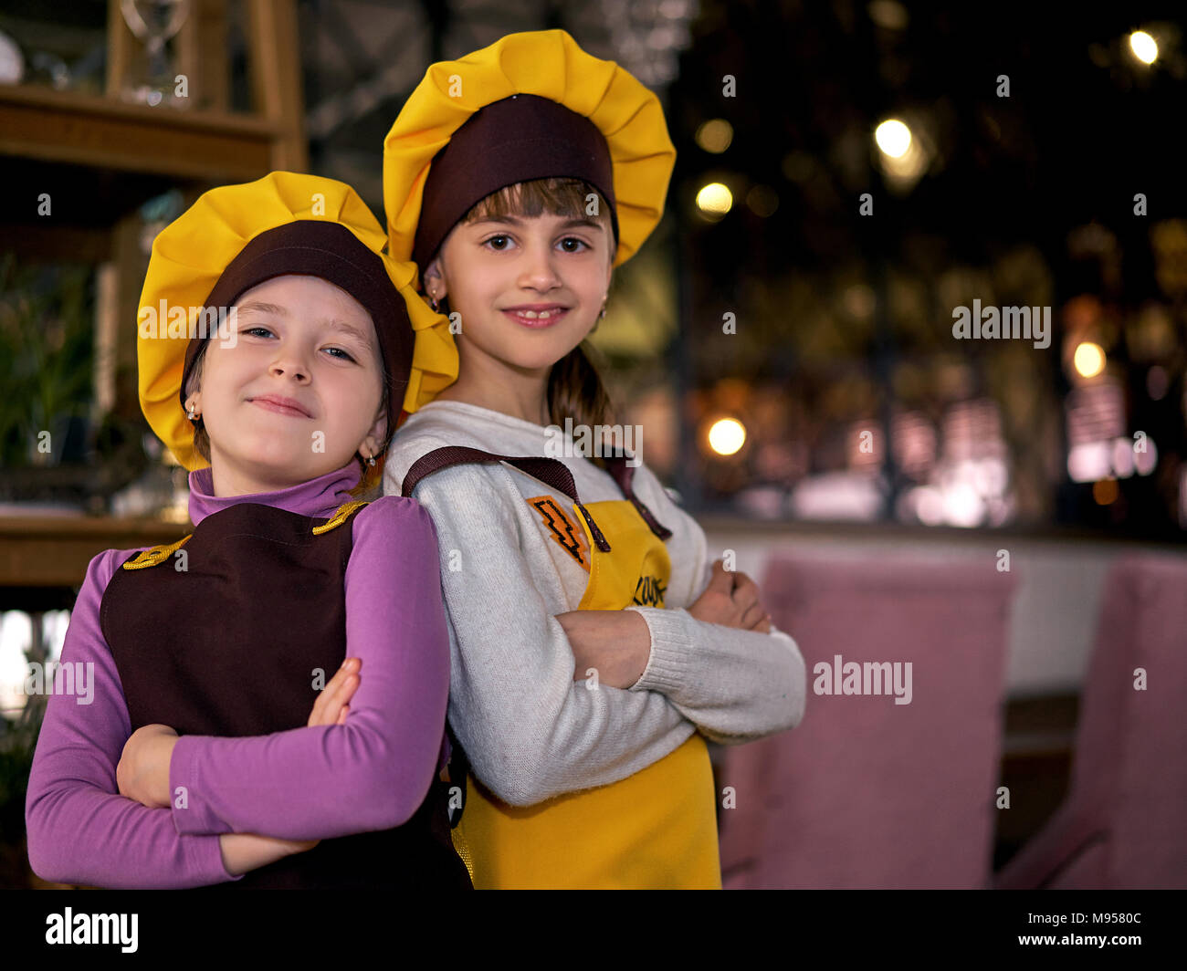girl in the hood chef restaurant Stock Photo - Alamy