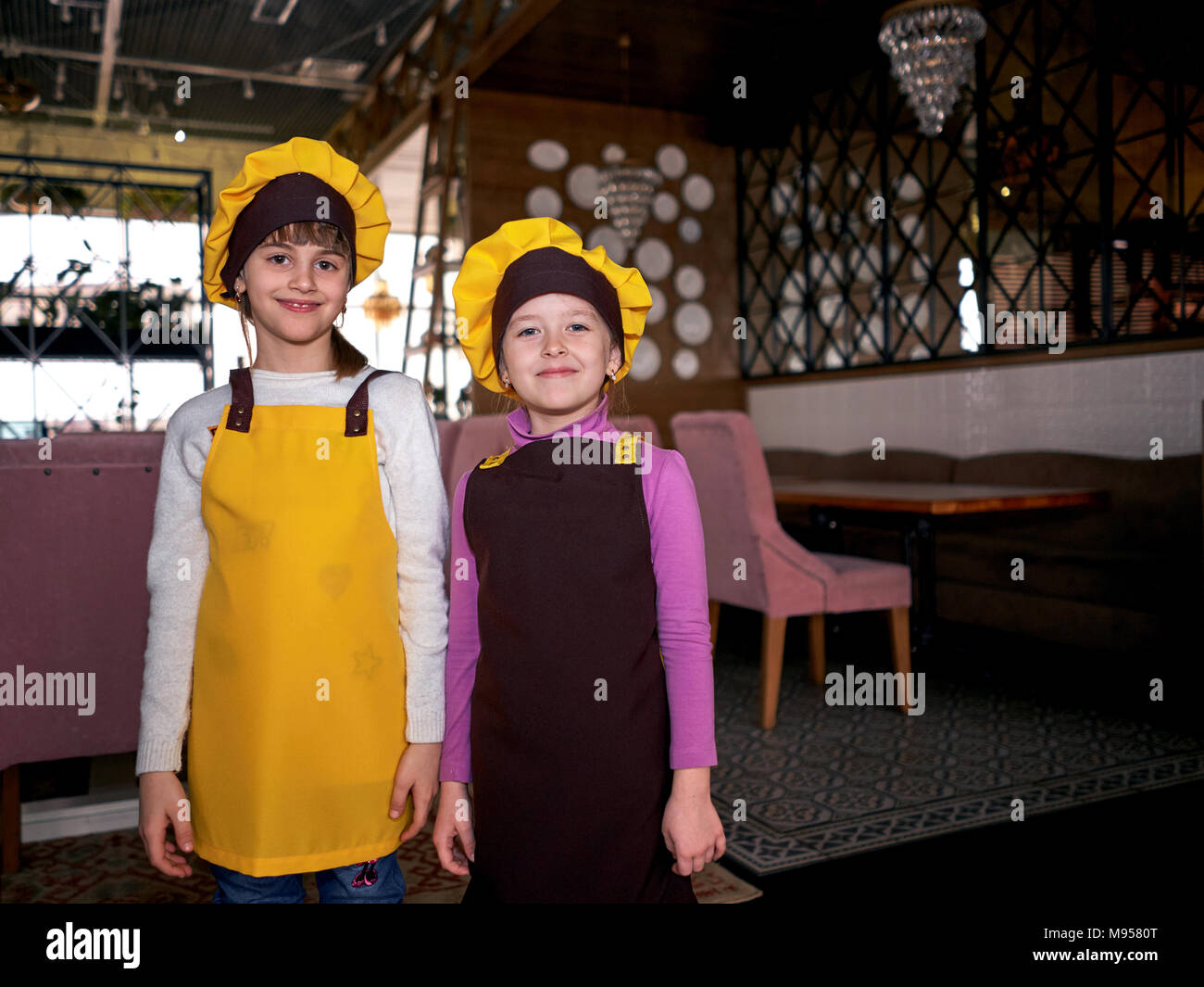 girl in the hood chef restaurant Stock Photo - Alamy